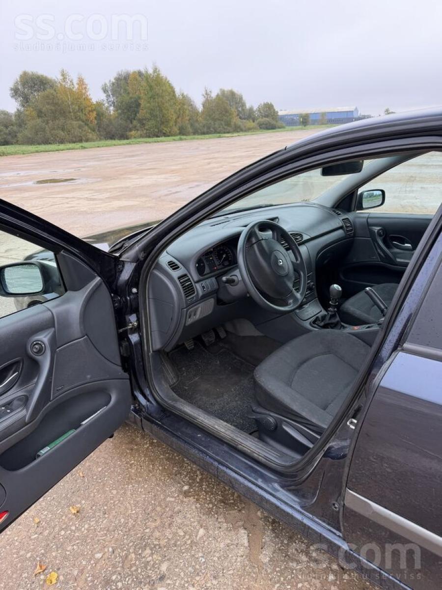 Zils Renault Laguna 2005 Rīga, ar dzinēja tilpumu 1.90 L un nobraukumu 385 tūkst. km par 1000 €, foto 17 vietnē AUTOMOTO.COM.LV