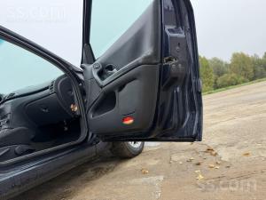 Zils Renault Laguna 2005 Rīga, ar dzinēja tilpumu 1.90 L un nobraukumu 385 tūkst. km par 1000 €, foto 19 vietnē AUTOMOTO.COM.LV