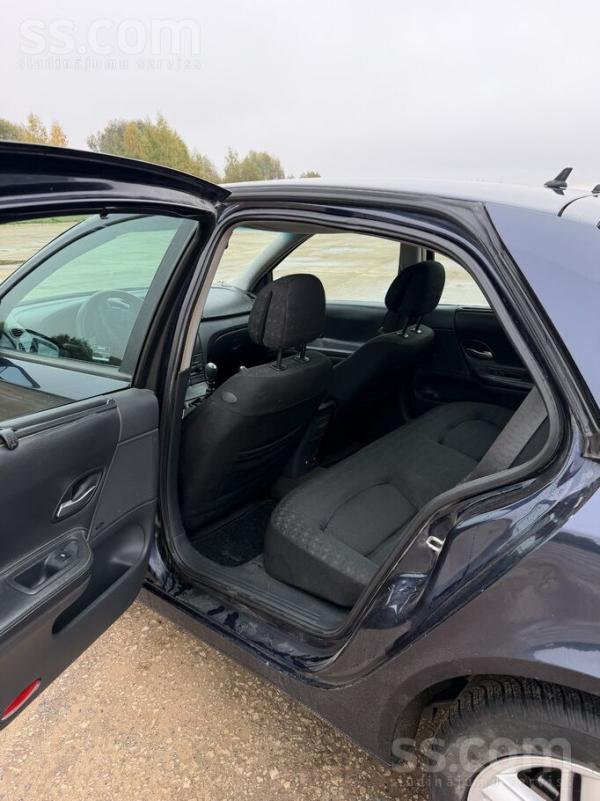 Blue Renault Laguna 2005 in Riga, with an engine capacity of 1.90 L and mileage of 385 thousand km for 1000 €, photo 11 on AUTOMOTO.COM.LV