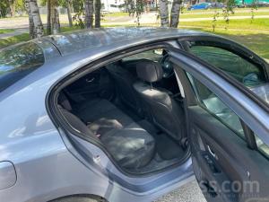 Zils Renault Laguna 2008 Rīga, ar dzinēja tilpumu 1.50 L un nobraukumu 372 tūkst. km par 1290 €, foto 12 vietnē AUTOMOTO.COM.LV