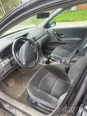 Zils Renault Laguna 2002 Rīga, ar dzinēja tilpumu 1.80 L un nobraukumu 263 tūkst. km par 750 €, foto 8 vietnē AUTOMOTO.COM.LV