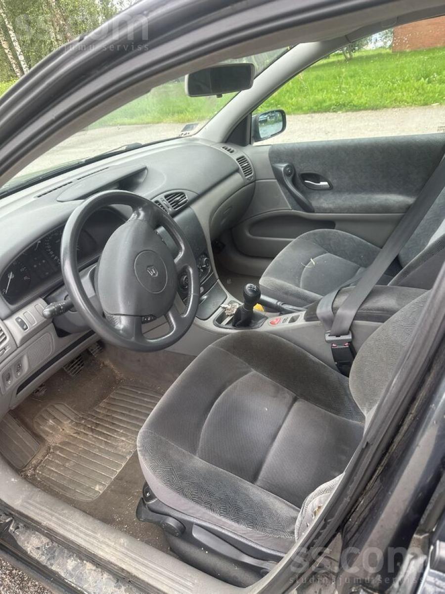 Zils Renault Laguna 2002 Rīga, ar dzinēja tilpumu 1.80 L un nobraukumu 263 tūkst. km par 750 €, foto 8 vietnē AUTOMOTO.COM.LV