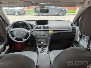 Blue Renault Laguna 2006 in Riga, with an engine capacity of 1.90 L and mileage of 292 thousand km for 1250 €, photo 4 on AUTOMOTO.COM.LV