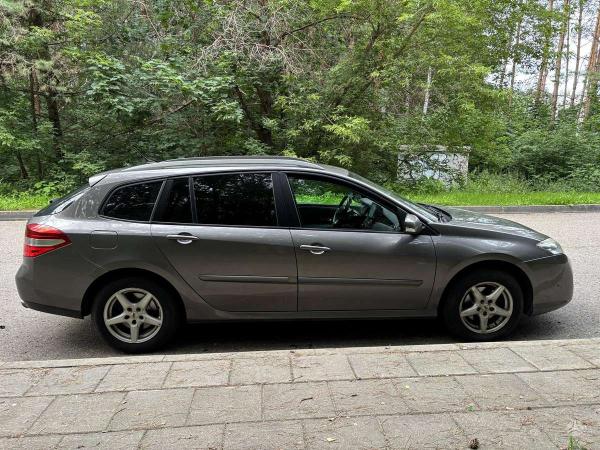Brūns Renault Laguna 2008 Viļņa, ar dzinēja tilpumu 2.00 L un nobraukumu 301 tūkst. km par 3000 €, foto 4 vietnē AUTOMOTO.COM.LV