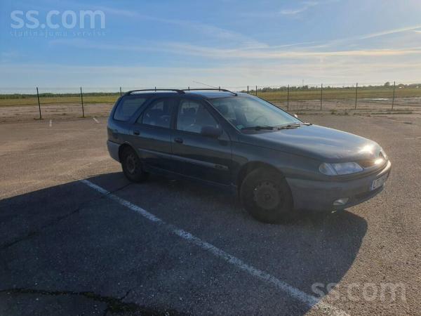 Green Renault Laguna 1997 in Liepaja, with an engine capacity of 1.80 L and mileage of 213 thousand km for 2900 €, photo 1 on AUTOMOTO.COM.LV