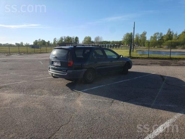 Green Renault Laguna 1997 in Liepaja, with an engine capacity of 1.80 L and mileage of 213 thousand km for 2900 €, photo 6 on AUTOMOTO.COM.LV