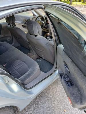 Pelēks Renault Laguna 2001 Prienai, ar dzinēja tilpumu 1.90 L un nobraukumu 248 tūkst. km par 790 €, foto 12 vietnē AUTOMOTO.COM.LV