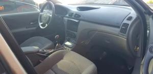 Grey Renault Laguna 2003 in Valmiera, with an engine capacity of 1.90 L and mileage of 297 thousand km for 1300 €, photo 13 on AUTOMOTO.COM.LV