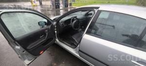 Pelēks Renault Laguna 2003 Daugavpils, ar dzinēja tilpumu 1.90 L un nobraukumu 270 tūkst. km par 700 €, foto 5 vietnē AUTOMOTO.COM.LV