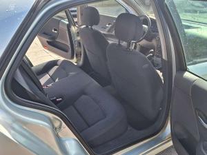 Grey Renault Laguna 2005 in Vilnius, with an engine capacity of 1.90 L and mileage of 234 thousand km for 750 €, photo 8 on AUTOMOTO.COM.LV