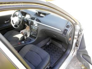 Grey Renault Laguna 2006 in Riga, with an engine capacity of 2.00 L and mileage of 250 thousand km for 1500 €, photo 6 on AUTOMOTO.COM.LV