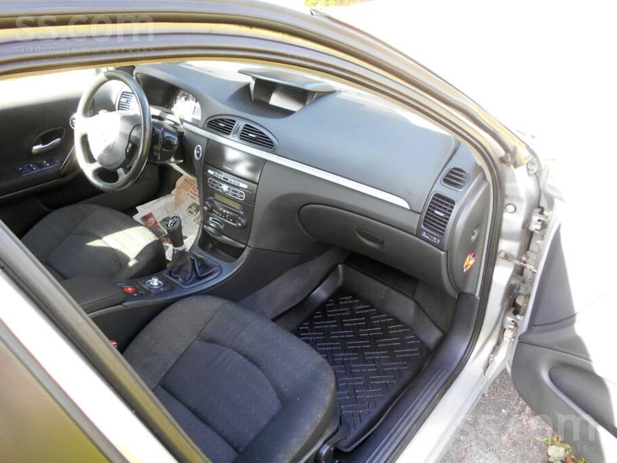 Grey Renault Laguna 2006 in Riga, with an engine capacity of 2.00 L and mileage of 250 thousand km for 1500 €, photo 6 on AUTOMOTO.COM.LV