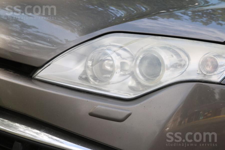 Pelēks Renault Laguna 2009 Rīga, ar dzinēja tilpumu 2.00 L un nobraukumu 305 tūkst. km par 1890 €, foto 25 vietnē AUTOMOTO.COM.LV