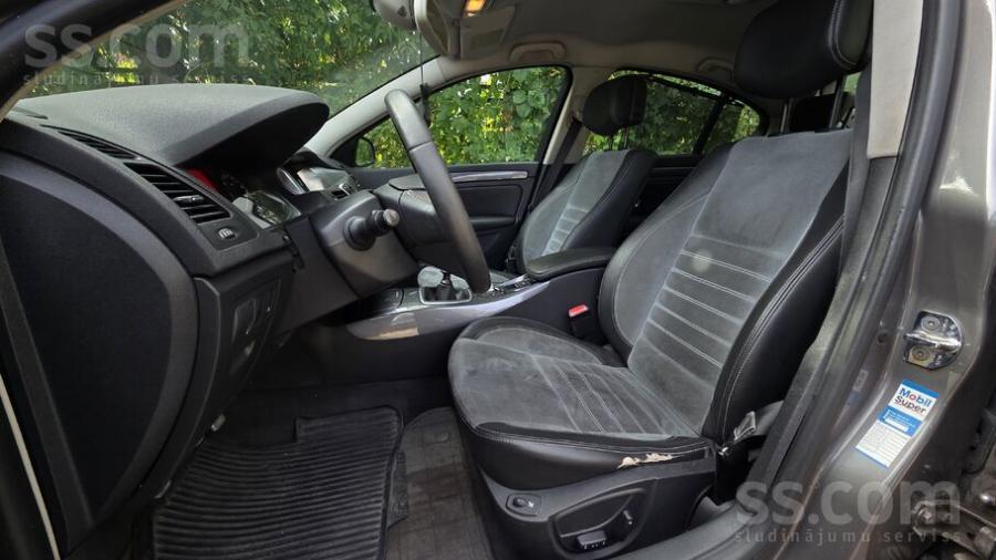 Grey Renault Laguna 2010 in Jelgava, with an engine capacity of 2.00 L and mileage of 0 thousand km for 1490 €, photo 11 on AUTOMOTO.COM.LV