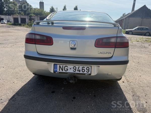 Pelēks Renault Laguna 2003 Daugavpils, ar dzinēja tilpumu 1.90 L un nobraukumu 267 tūkst. km par 900 €, foto 4 vietnē AUTOMOTO.COM.LV