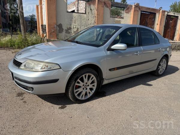 Pelēks Renault Laguna 2003 Daugavpils, ar dzinēja tilpumu 1.90 L un nobraukumu 267 tūkst. km par 900 €, foto 5 vietnē AUTOMOTO.COM.LV