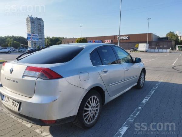Pelēks Renault Laguna 2007 Rīga, ar dzinēja tilpumu 2.00 L un nobraukumu 291 tūkst. km par 1000 €, foto 5 vietnē AUTOMOTO.COM.LV