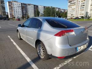 Pelēks Renault Laguna 2007 Rīga, ar dzinēja tilpumu 2.00 L un nobraukumu 291 tūkst. km par 1000 €, foto 7 vietnē AUTOMOTO.COM.LV