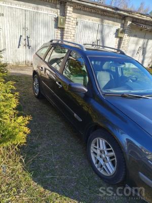 Pelēks Renault Laguna 2005 Rīga, ar dzinēja tilpumu 1.90 L un nobraukumu 210 tūkst. km par 1100 €, foto 4 vietnē AUTOMOTO.COM.LV