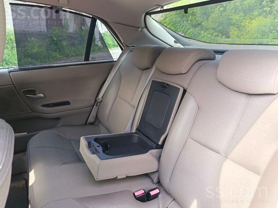 Grey Renault Laguna 2006 in Riga, with an engine capacity of 2.00 L and mileage of 209 thousand km for 1450 €, photo 7 on AUTOMOTO.COM.LV