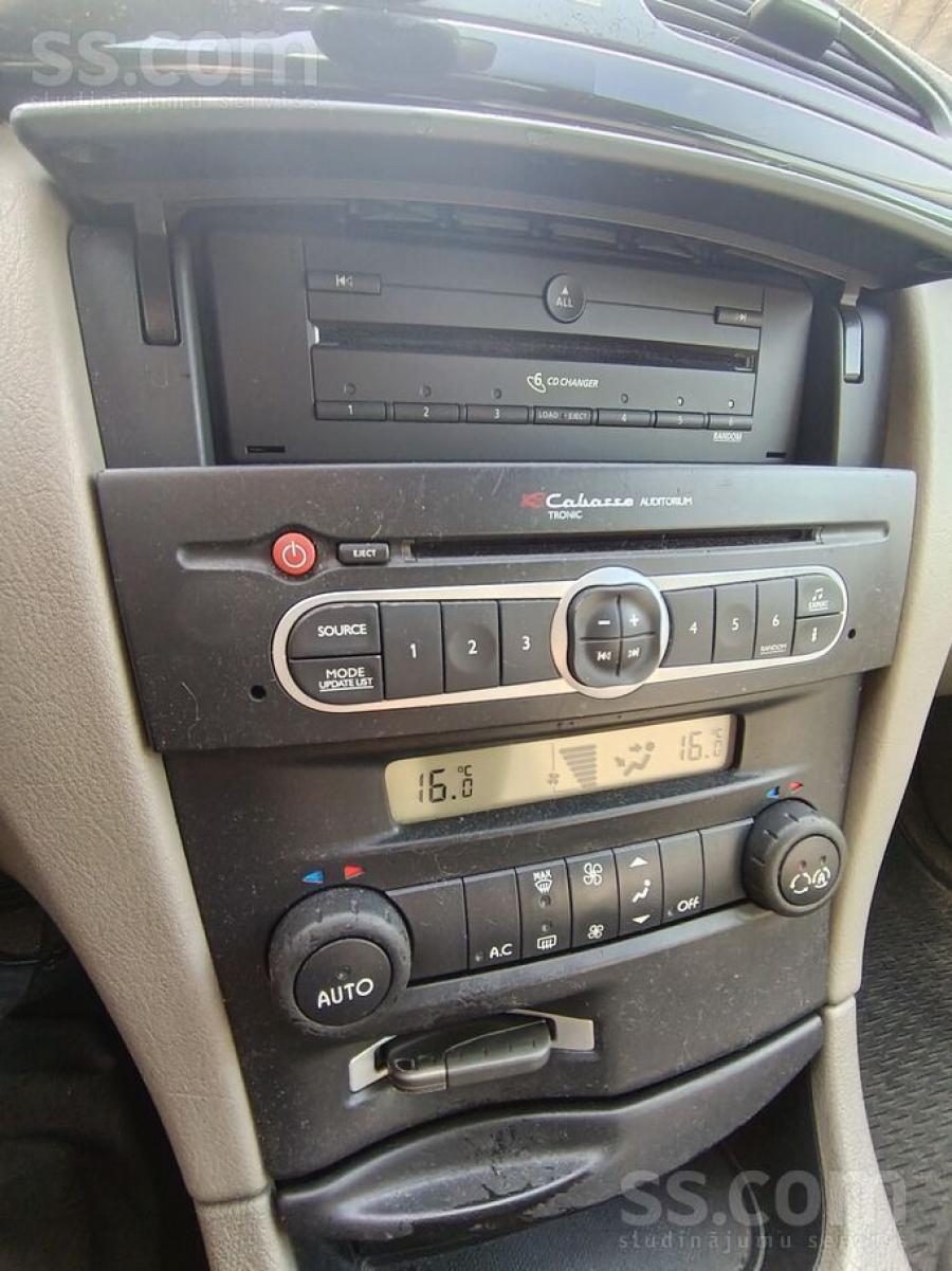 Grey Renault Laguna 2006 in Riga, with an engine capacity of 2.00 L and mileage of 209 thousand km for 1450 €, photo 12 on AUTOMOTO.COM.LV