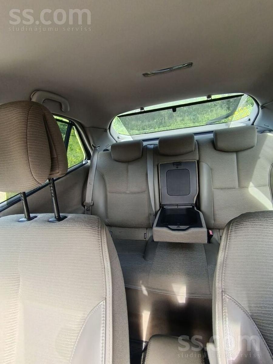 Grey Renault Laguna 2006 in Riga, with an engine capacity of 2.00 L and mileage of 209 thousand km for 1450 €, photo 13 on AUTOMOTO.COM.LV