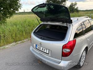 Pelēks Renault Laguna 2007 Tallina, ar dzinēja tilpumu 1.90 L un nobraukumu 250 tūkst. km par 1800 €, foto 18 vietnē AUTOMOTO.COM.LV