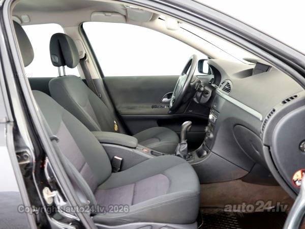 Grey Renault Laguna 2007 in Tallinn, with an engine capacity of 2.20 L and mileage of 311 thousand km for 1199 €, photo 7 on AUTOMOTO.COM.LV