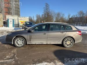Pelēks Renault Laguna 2009 Rīga, ar dzinēja tilpumu 2.00 L un nobraukumu 352 tūkst. km par 2300 €, foto 2 vietnē AUTOMOTO.COM.LV