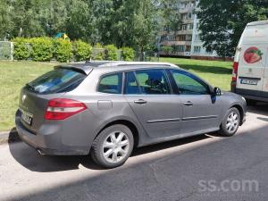Pelēks Renault Laguna 2009 Rīga, ar dzinēja tilpumu 2.00 L un nobraukumu 300 tūkst. km par 1100 €, foto 5 vietnē AUTOMOTO.COM.LV