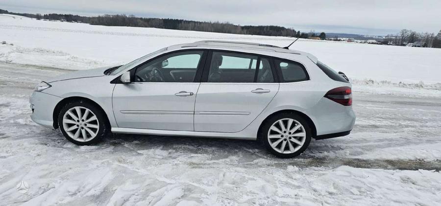 Grey Renault Laguna 2011 in Marijampole, with an engine capacity of 1.46 L and mileage of 257 thousand km for 3500 €, photo 10 on AUTOMOTO.COM.LV