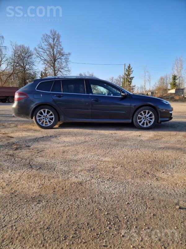 Grey Renault Laguna 2011 in Daugavpils, with an engine capacity of 2.00 L and mileage of 296 thousand km for 3600 €, photo 4 on AUTOMOTO.COM.LV