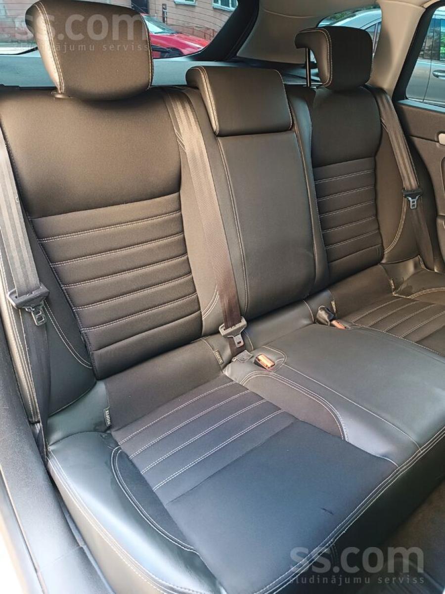 Pelēks Renault Laguna 2012 Rīga, ar dzinēja tilpumu 1.50 L un nobraukumu 314 tūkst. km par 2990 €, foto 9 vietnē AUTOMOTO.COM.LV