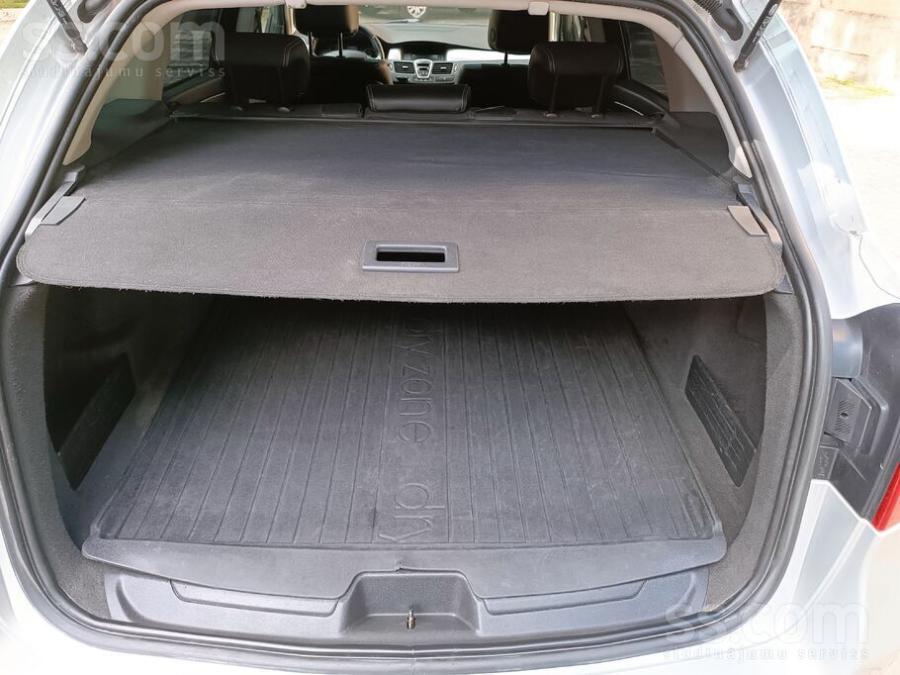 Pelēks Renault Laguna 2012 Rīga, ar dzinēja tilpumu 1.50 L un nobraukumu 314 tūkst. km par 2990 €, foto 12 vietnē AUTOMOTO.COM.LV