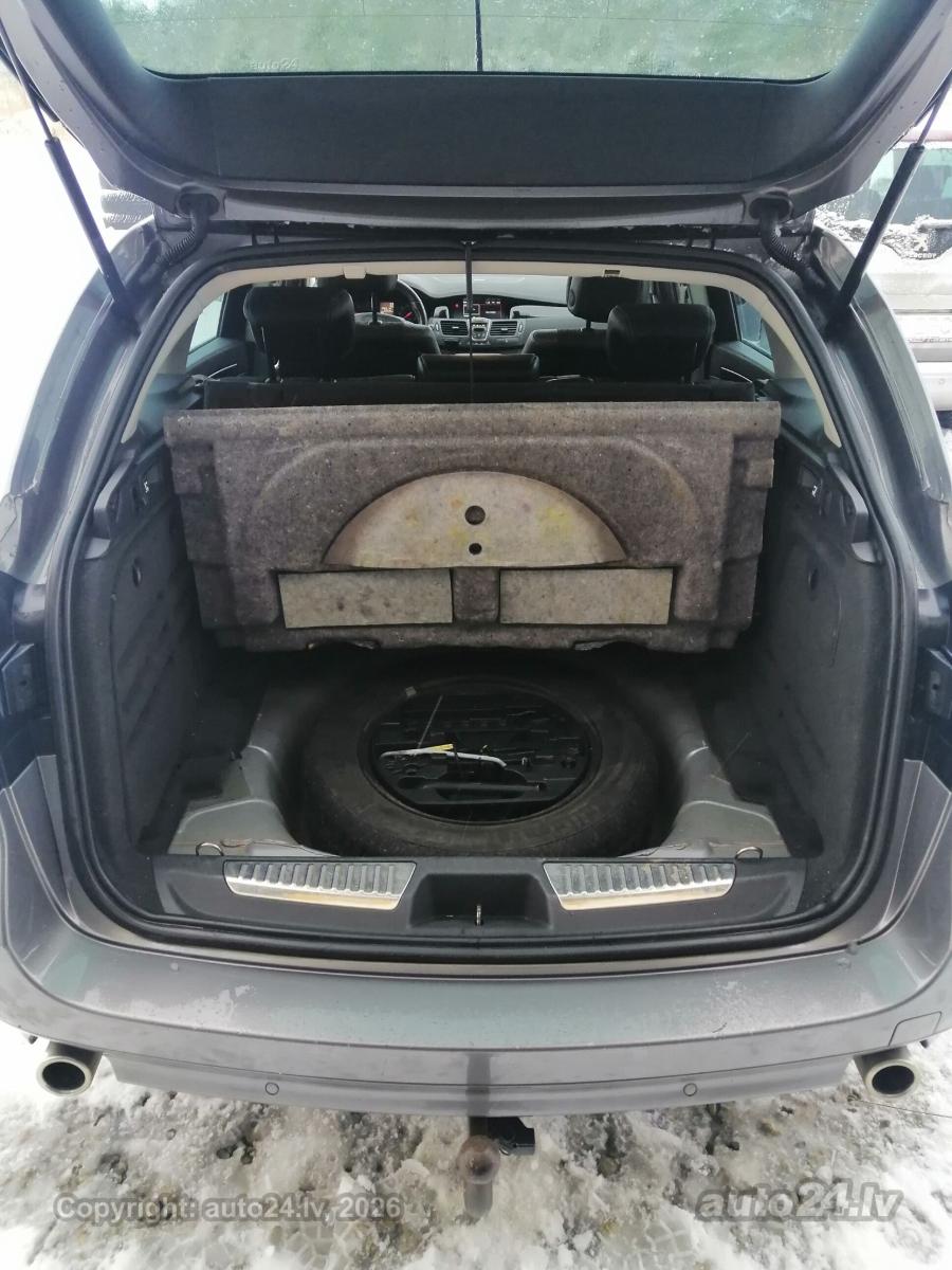 Grey Renault Laguna 2015 in Tallinn, with an engine capacity of 1.50 L and mileage of 198 thousand km for 7500 €, photo 26 on AUTOMOTO.COM.LV