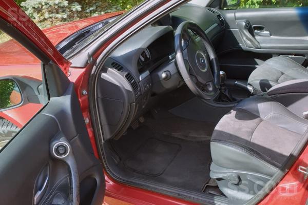 Red Renault Laguna 2005 in Talsi, with an engine capacity of 1.90 L and mileage of 378 thousand km for 750 €, photo 5 on AUTOMOTO.COM.LV