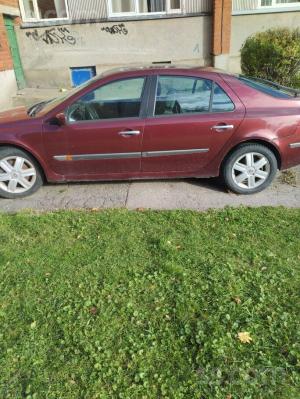 Red Renault Laguna 2004 in Riga, with an engine capacity of 2.00 L and mileage of 236 thousand km for 1100 €, photo 6 on AUTOMOTO.COM.LV
