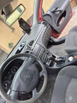 Sarkans Renault Laguna 2007 Šauļi, ar dzinēja tilpumu 1.99 L un nobraukumu 261 tūkst. km par 1000 €, foto 8 vietnē AUTOMOTO.COM.LV