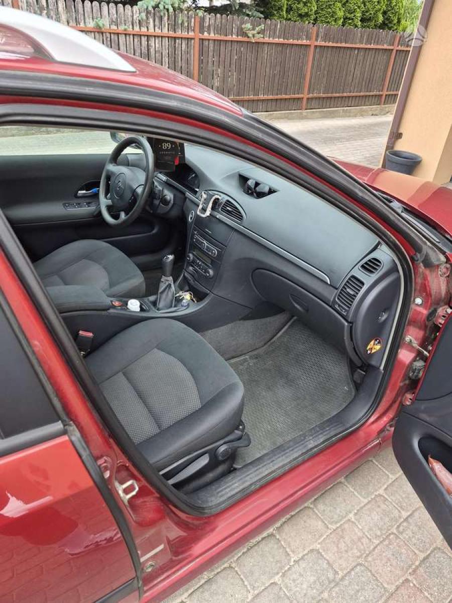 Sarkans Renault Laguna 2007 Šauļi, ar dzinēja tilpumu 1.99 L un nobraukumu 261 tūkst. km par 1000 €, foto 11 vietnē AUTOMOTO.COM.LV