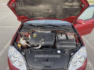Red Renault Laguna 2009 in Riga, with an engine capacity of 1.50 L and mileage of 127 thousand km for 5150 €, photo 12 on AUTOMOTO.COM.LV