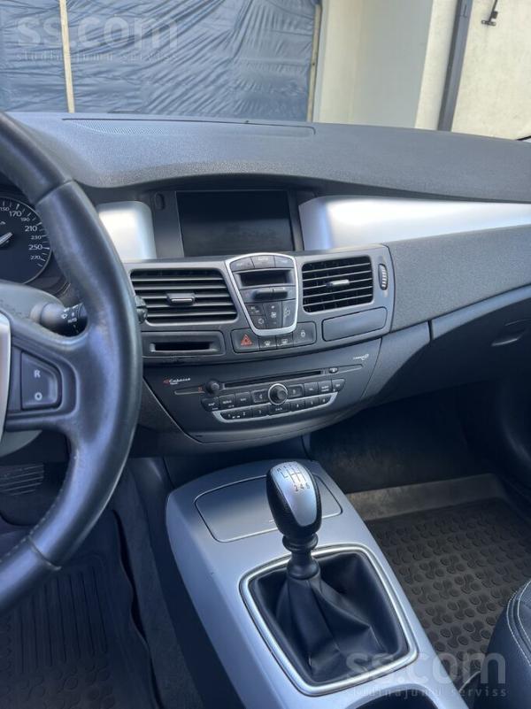 Renault Laguna 2009 in Riga, with an engine capacity of 2.00 L and mileage of 381 thousand km for 1900 €, photo 8 on AUTOMOTO.COM.LV