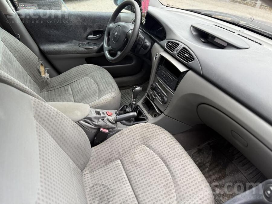 Violets Renault Laguna 2004 Kuldīga, ar dzinēja tilpumu 1.80 L un nobraukumu 237 tūkst. km par 550 €, foto 6 vietnē AUTOMOTO.COM.LV