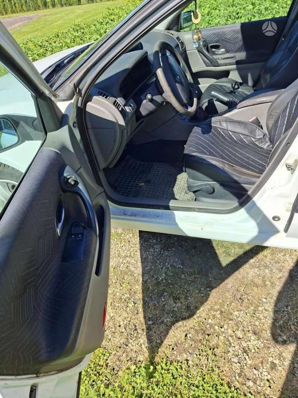 Balts Renault Laguna 2002 Joniškis, ar dzinēja tilpumu 1.87 L un nobraukumu 388 tūkst. km par 700 €, foto 8 vietnē AUTOMOTO.COM.LV