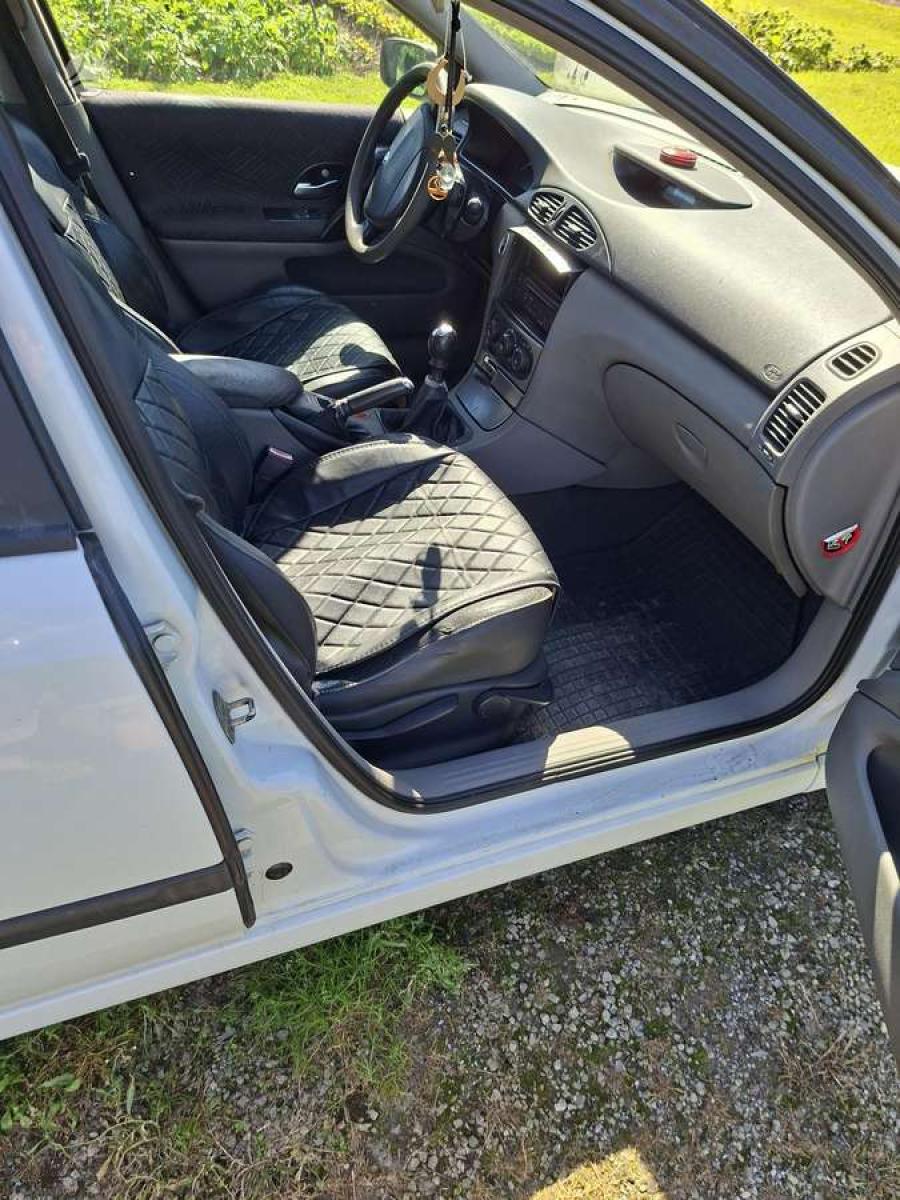 Balts Renault Laguna 2002 Joniškis, ar dzinēja tilpumu 1.87 L un nobraukumu 388 tūkst. km par 700 €, foto 10 vietnē AUTOMOTO.COM.LV