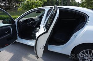 White Renault Laguna 2011 in Jurmala, with an engine capacity of 1.50 L and mileage of 245 thousand km for 3995 €, photo 11 on AUTOMOTO.COM.LV