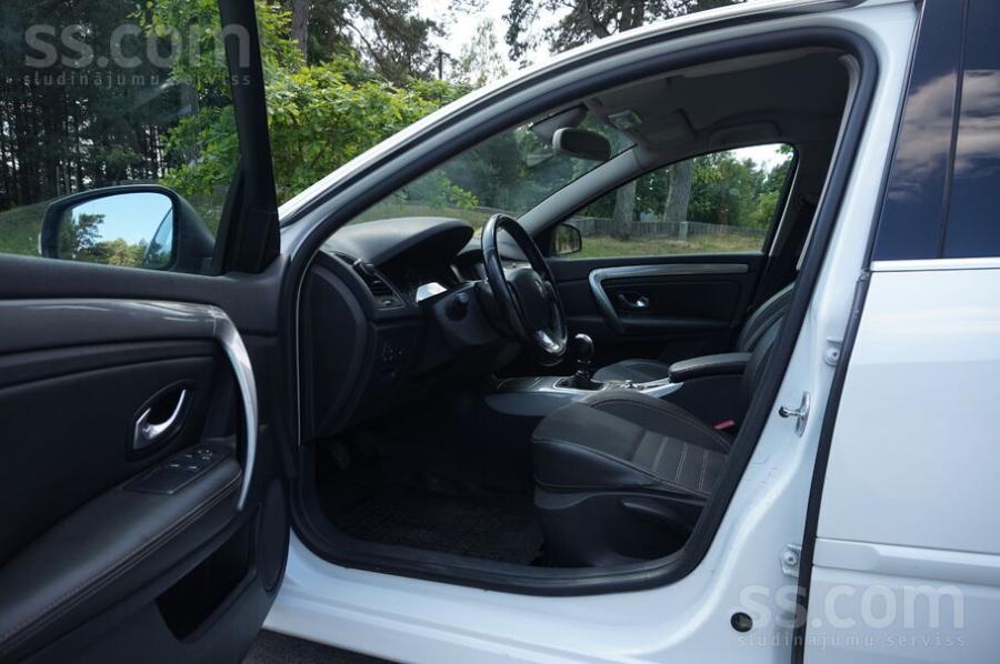 White Renault Laguna 2011 in Jurmala, with an engine capacity of 1.50 L and mileage of 245 thousand km for 3995 €, photo 12 on AUTOMOTO.COM.LV