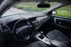 White Renault Laguna 2011 in Jurmala, with an engine capacity of 1.50 L and mileage of 245 thousand km for 3995 €, photo 13 on AUTOMOTO.COM.LV