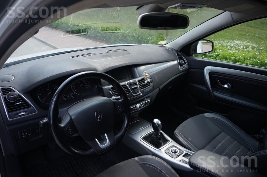 White Renault Laguna 2011 in Jurmala, with an engine capacity of 1.50 L and mileage of 245 thousand km for 3995 €, photo 13 on AUTOMOTO.COM.LV