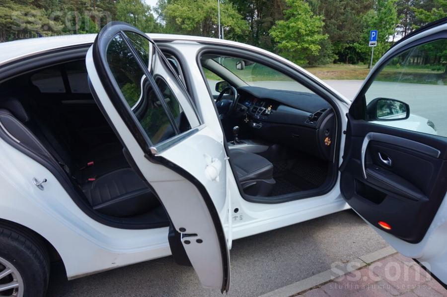 White Renault Laguna 2011 in Jurmala, with an engine capacity of 1.50 L and mileage of 245 thousand km for 3995 €, photo 15 on AUTOMOTO.COM.LV