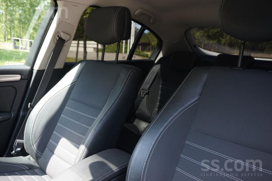 White Renault Laguna 2011 in Jurmala, with an engine capacity of 1.50 L and mileage of 245 thousand km for 3995 €, photo 25 on AUTOMOTO.COM.LV